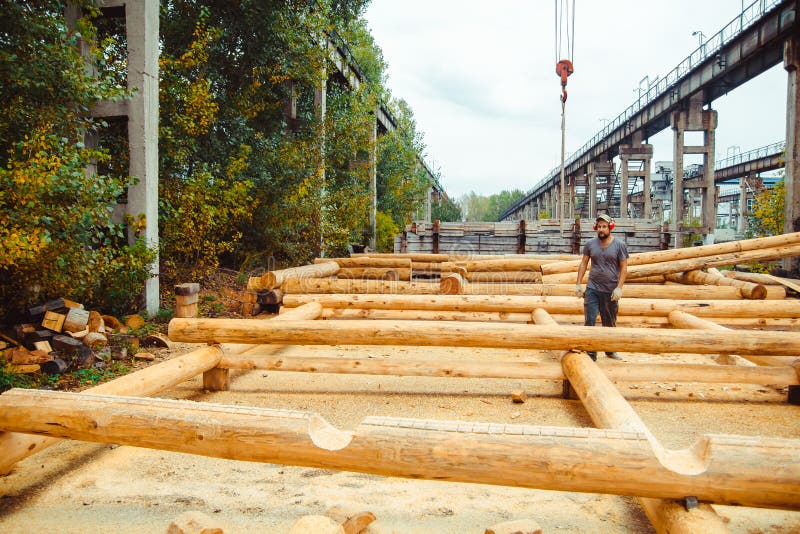 Workers Build a House of Logs Stock Photo - Image of closeup, color ...