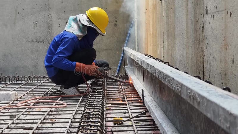 Workers are Reinforcing Steel Bars Essential for the Stability of ...