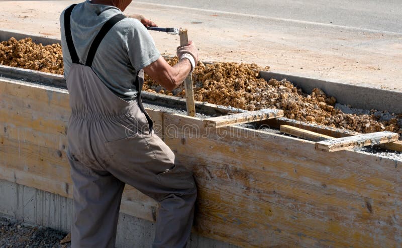 Workers Removes Formwork from a Concrete Wall Stock Photo - Image of ...