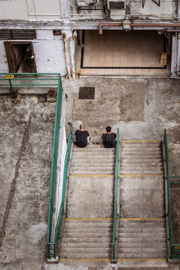 Workers Resting on a Staircase in Spare Time Stock Photo - Image of ...