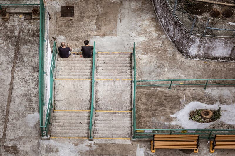 Workers Resting on a Staircase in Spare Time Stock Image - Image of ...