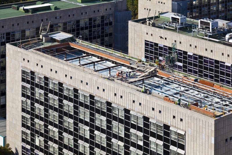Workers Restoring a Building Roof Stock Photo - Image of exterior, roof ...
