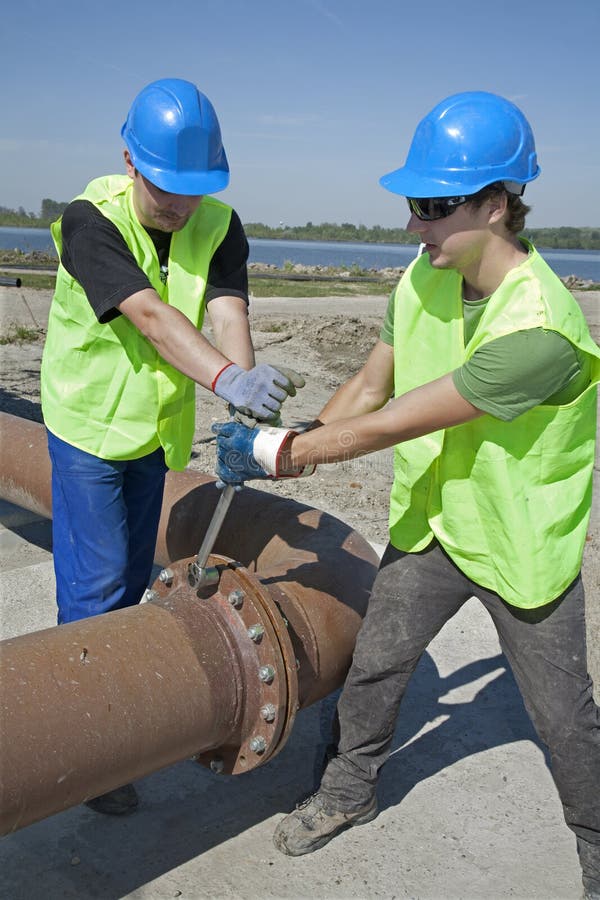 Workers by retightenig stock image. Image of retighten - 24727909