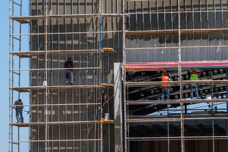 Workers on Scaffolding at a Construction Site Editorial Photography ...