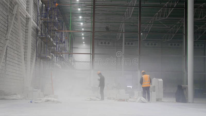 Workers on Scaffolding Inside Large and Modern Warehouse Stock Image ...