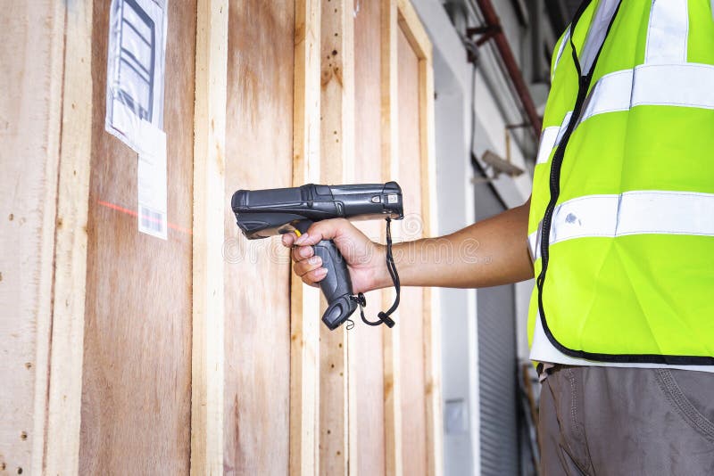 Workers Scanning Bar Code Scanner on Label Cargo Shipping. Warehouse ...
