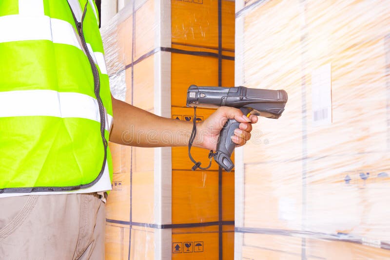 Workers Scanning Bar Code Scanner on Label. Torehouse, Shipment Boxes ...