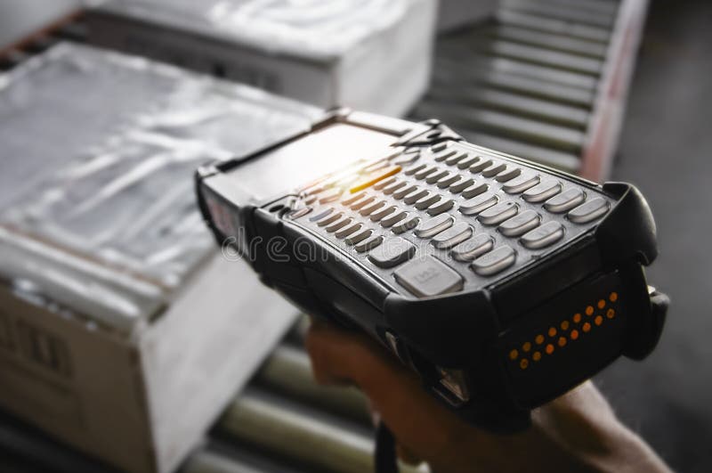 Workers Scanning Bar Code Scanner on Package Boxes on Conveyor Belt ...