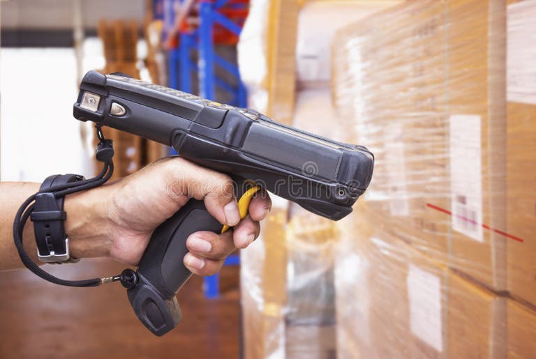 Workers Scanning Bar Code Scanner on Package Boxes. Shipping Warehouse ...