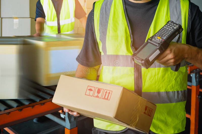 Workers Scanning Bar Code Scanner on Package Boxes. Storehouse ...