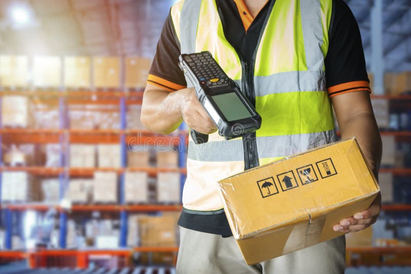 Workers Scanning Bar Code Scanner on Packaging Boxes. Shipping ...