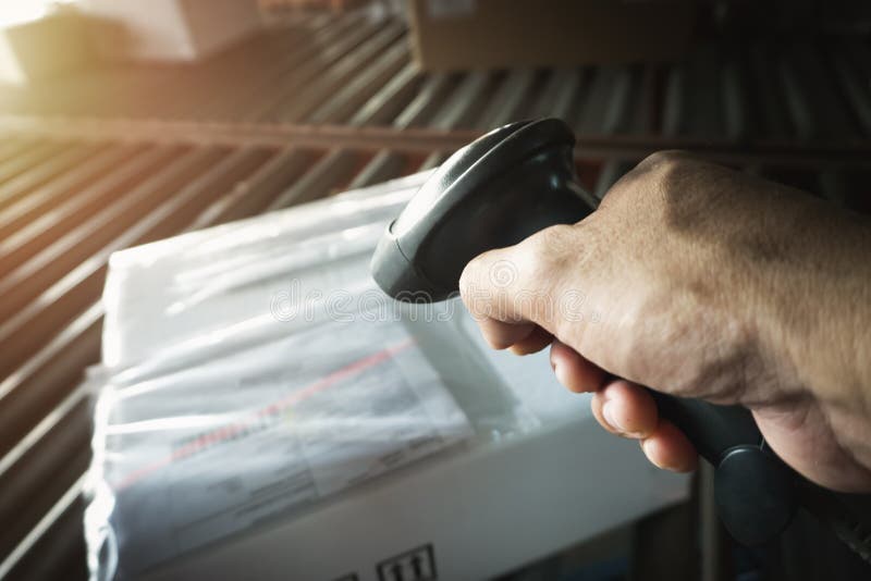 Workers Scanning Bar Code Scanner on Packaging Boxes. Shipping ...