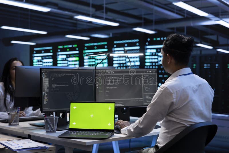 Workers In Server Room Checking Systems Bottlenecks Using Mockup