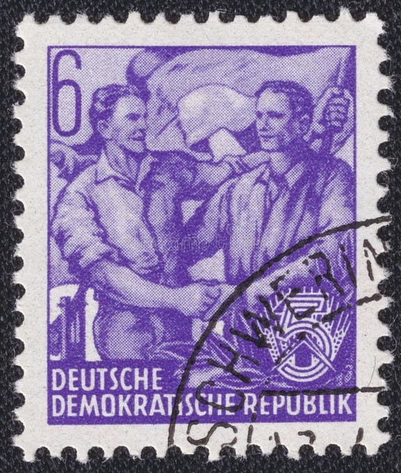 Workers Shake Hands in Front of a Flag on a 1957 GDR Vintage Postage ...