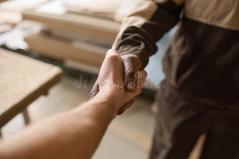 Workers Shaking Hands and Working in Team Stock Image - Image of ...