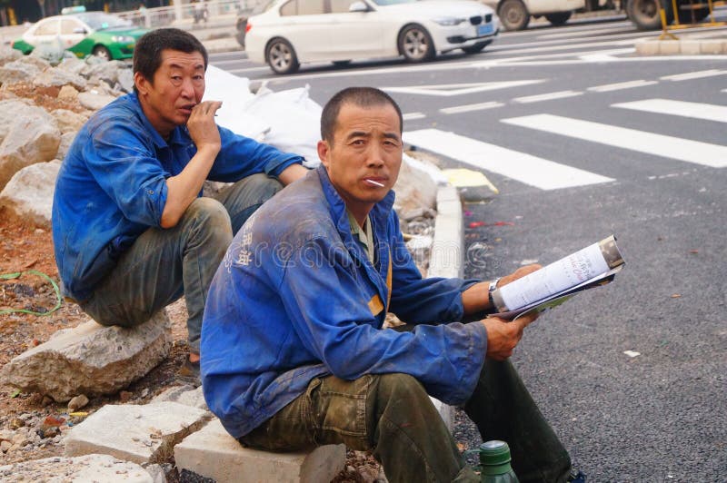 Workers on the sidewalk. editorial stock photo. Image of sidewalks ...