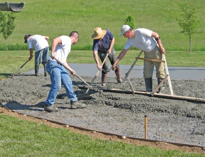 Workers smoothing concrete stock image. Image of pour - 1602215