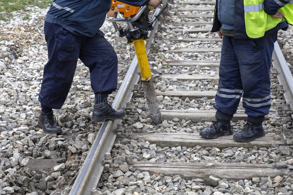Workers Start Removing Clips from the Railway Tracks Stock Image ...