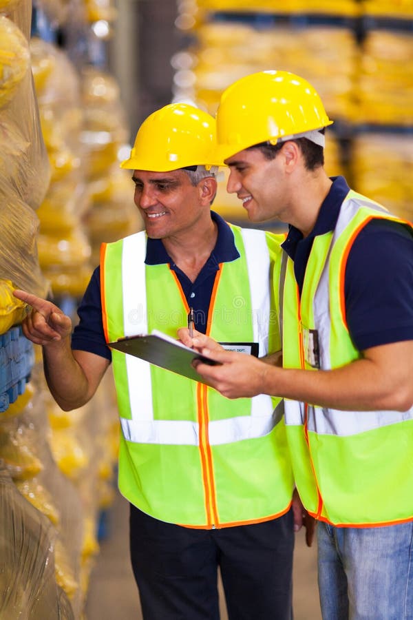 Workers in Factory Warehouse Stock Photo - Image of document, indoor ...