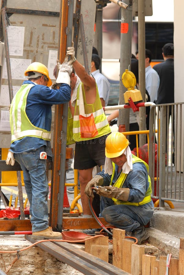 Workers at Street Level editorial image. Image of street - 1104055