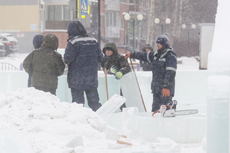 Workers Talk on the Construction Site of the Ice Town Stock Image ...