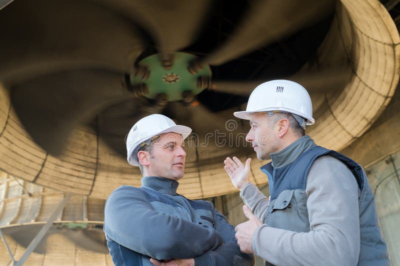 Workers Talking Outside Factory Stock Image - Image of plane, staircase ...