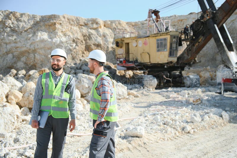 Workers Talking in Rock Quarry Stock Image - Image of business, mining ...