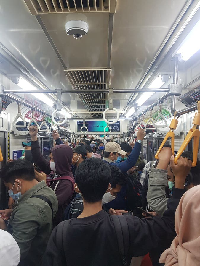 Workers on Their Way Home on the Train Editorial Photography - Image of ...