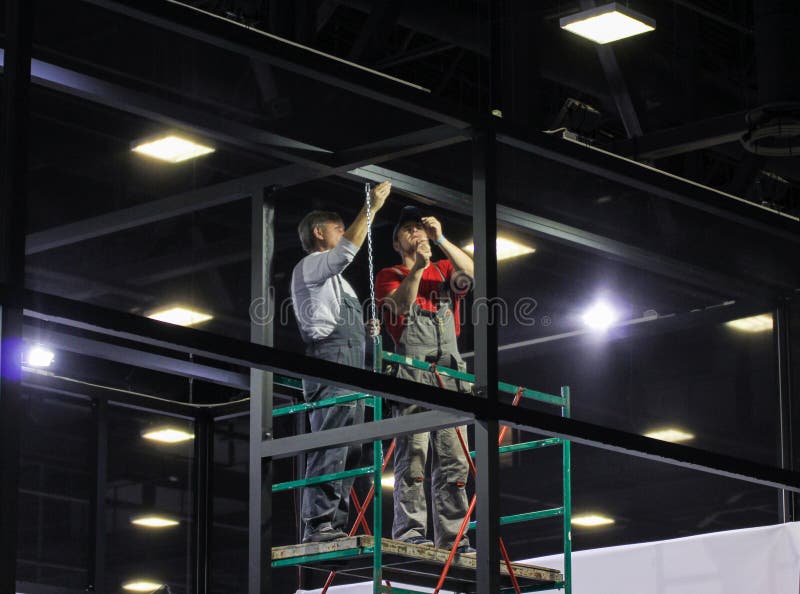 Workers on the Tower Fix the Structures. Editorial Image - Image of ...
