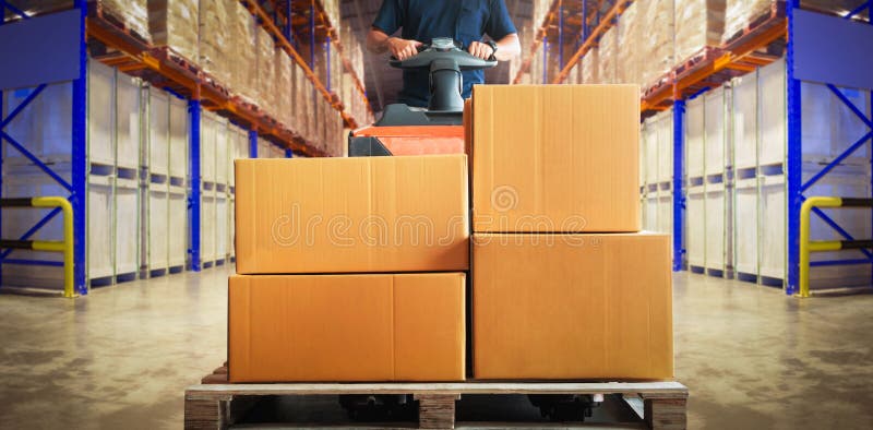 Workers Unloading Package Boxes on Pallets in Storage Warehouse ...