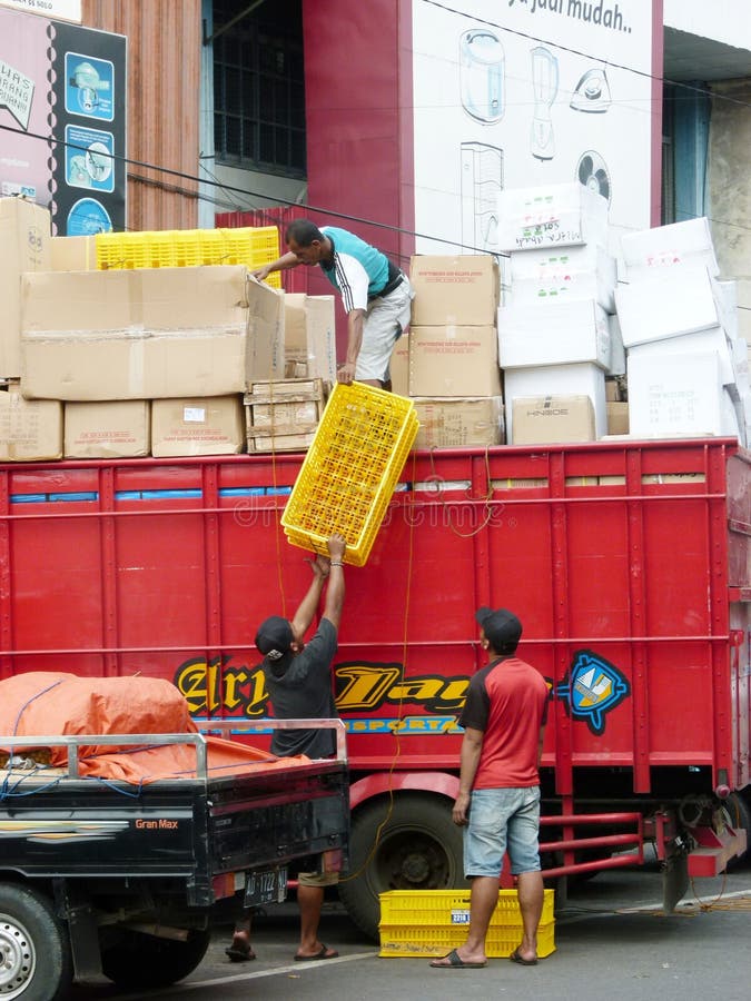 Workers editorial photo. Image of center, unloading, trading - 69228061