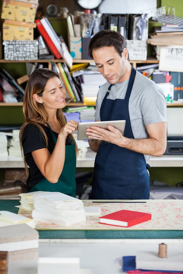 Workers Using Digital Tablet in Paper Factory Stock Image - Image of ...
