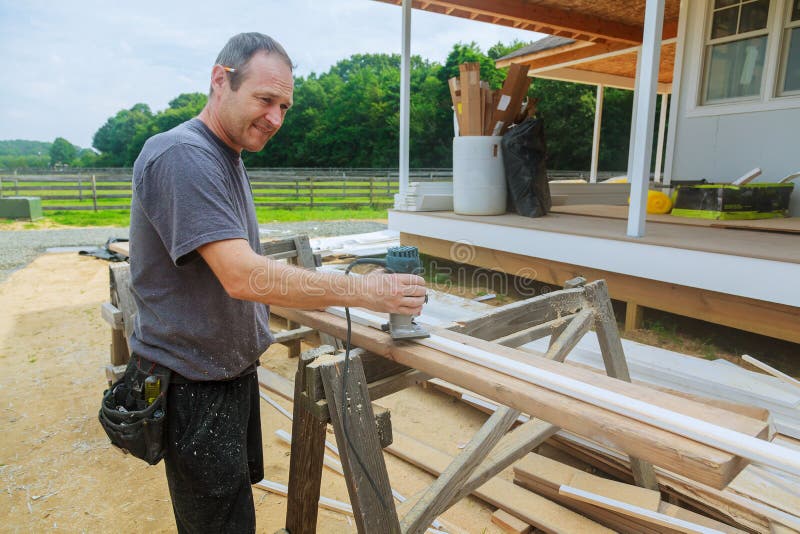Workers Using Electric Routering To Cut Down Stripes Stock Image ...