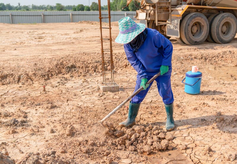 Workers are Using a Shovel To Adjust Surface Soil Stock Photo - Image ...