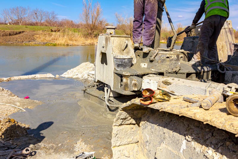 Pouring Liquid Concrete in Bridge Foundation Stock Image - Image of ...