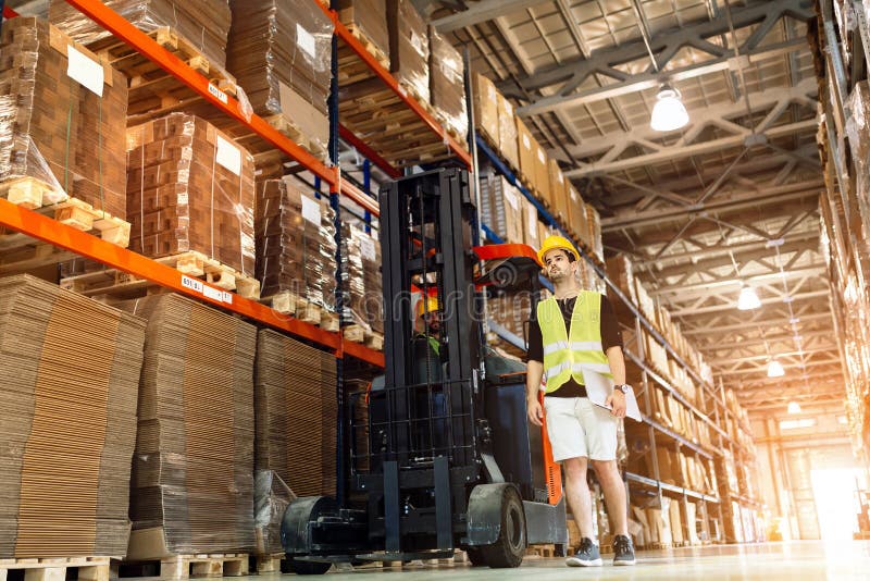 Logistics Manager Posing in Warehouse Stock Image - Image of presenting ...