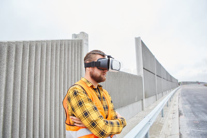 Workers with VR Glasses on the Road Construction Site Stock Image ...