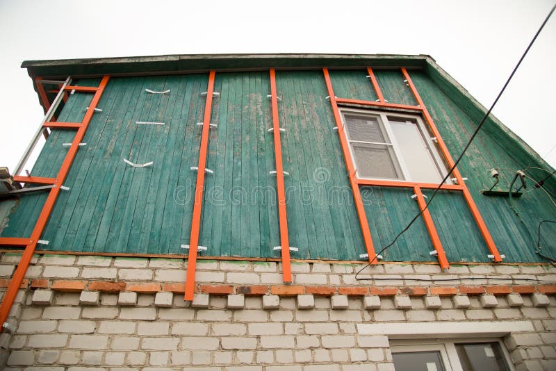 Workers Walling the House with Wall Siding Stock Photo - Image of paint ...