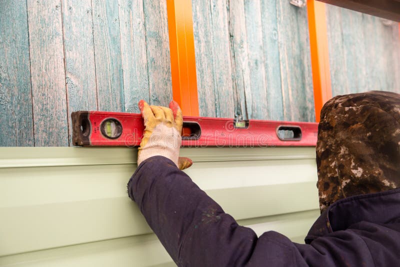 Workers Walling the House with Wall Siding Stock Image - Image of ...