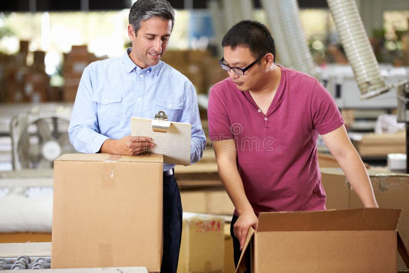Workers in Warehouse Preparing Goods for Dispatch Stock Image - Image ...