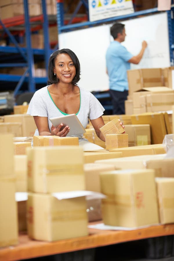 Workers in Warehouse Preparing Goods for Dispatch Stock Image - Image ...