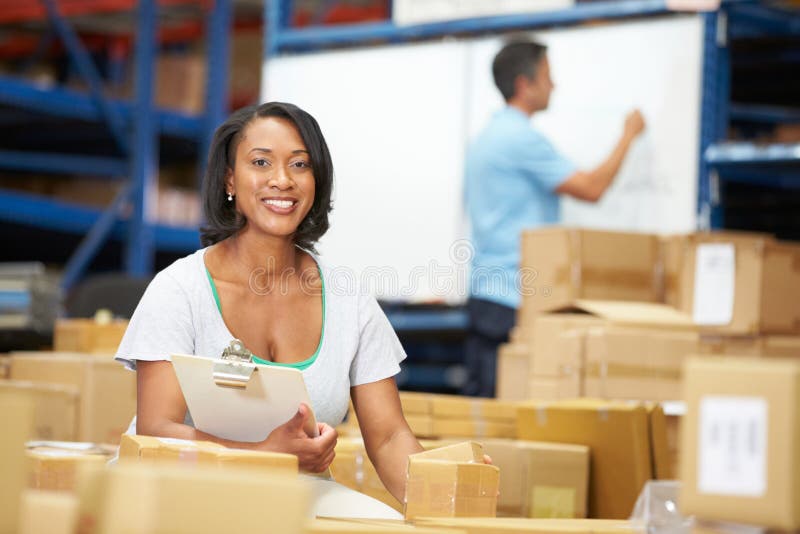 Workers in Warehouse Preparing Goods for Dispatch Stock Photo - Image ...
