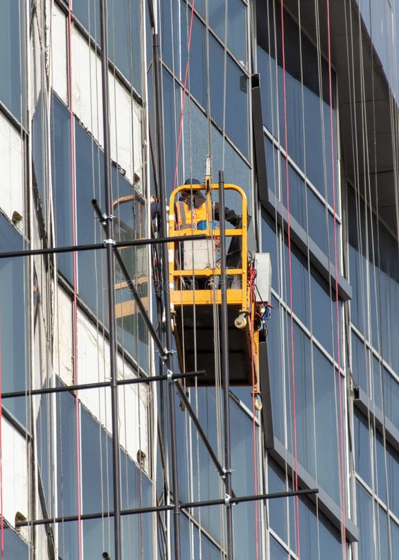Workers Wash Windows on a Building Stock Photo - Image of clean, facade ...