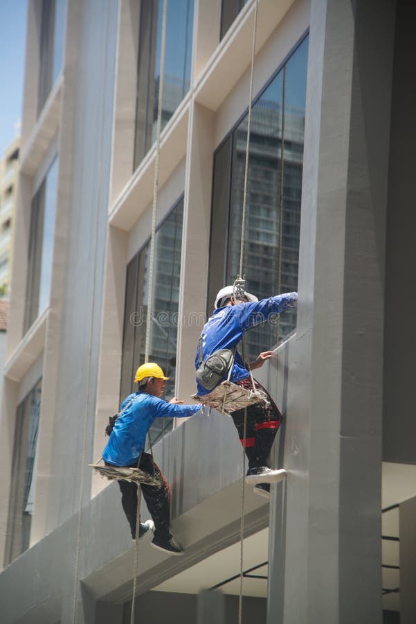 Workers Washing Windows of the Skyscraper Building. Window Washer ...
