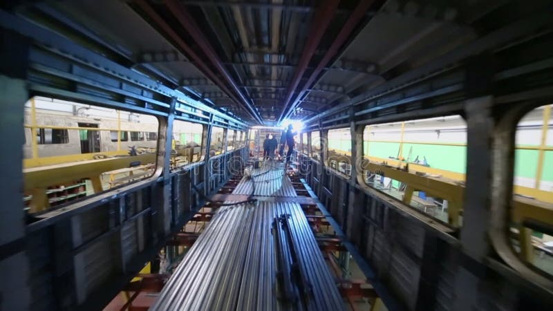 Workers Weld Inside Dark Train Coach at Workshop Stock Footage - Video ...