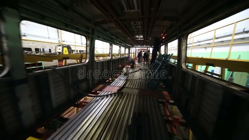 Workers Weld Inside Dark Train Wagon at Workshop Stock Video - Video of ...