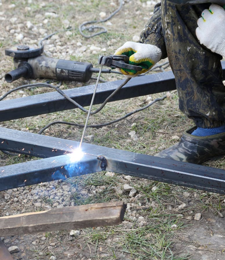 Workers Weld Metal for Sliding Gates. Stock Image - Image of iron, rack ...