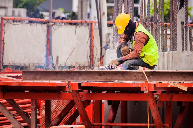 Workers are Welding Steel. Construction Workers Working Stock Photo ...