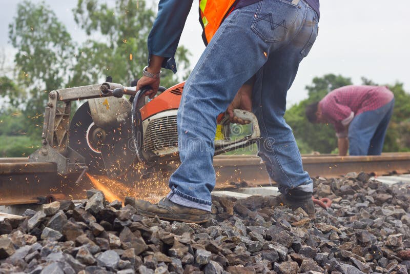 Workers Cutting Tracks for Maintenance. Stock Image - Image of people ...