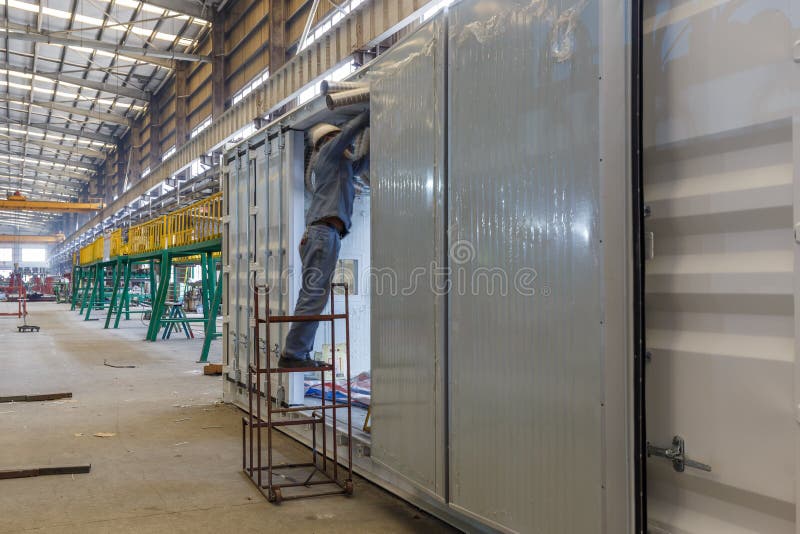 Workers Work in a Container Factory Workshop Stock Image - Image of ...